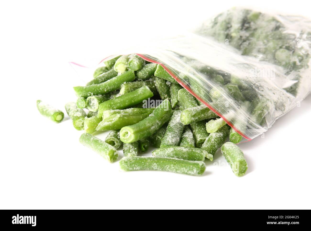Plastic bag with frozen green beans on white background Stock Photo - Alamy