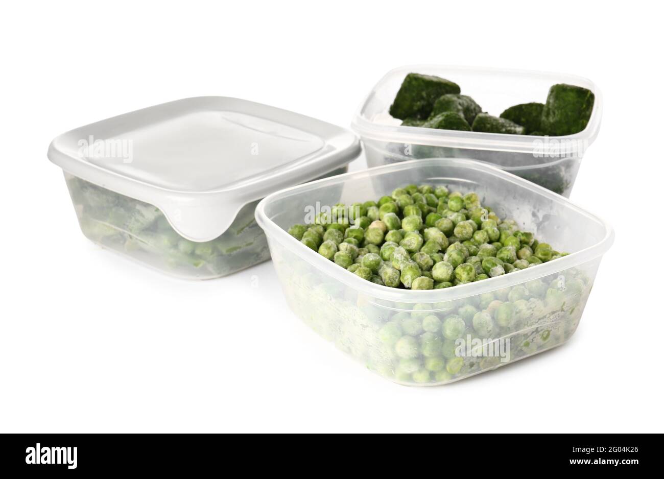 Plastic containers with frozen vegetables on white background Stock ...