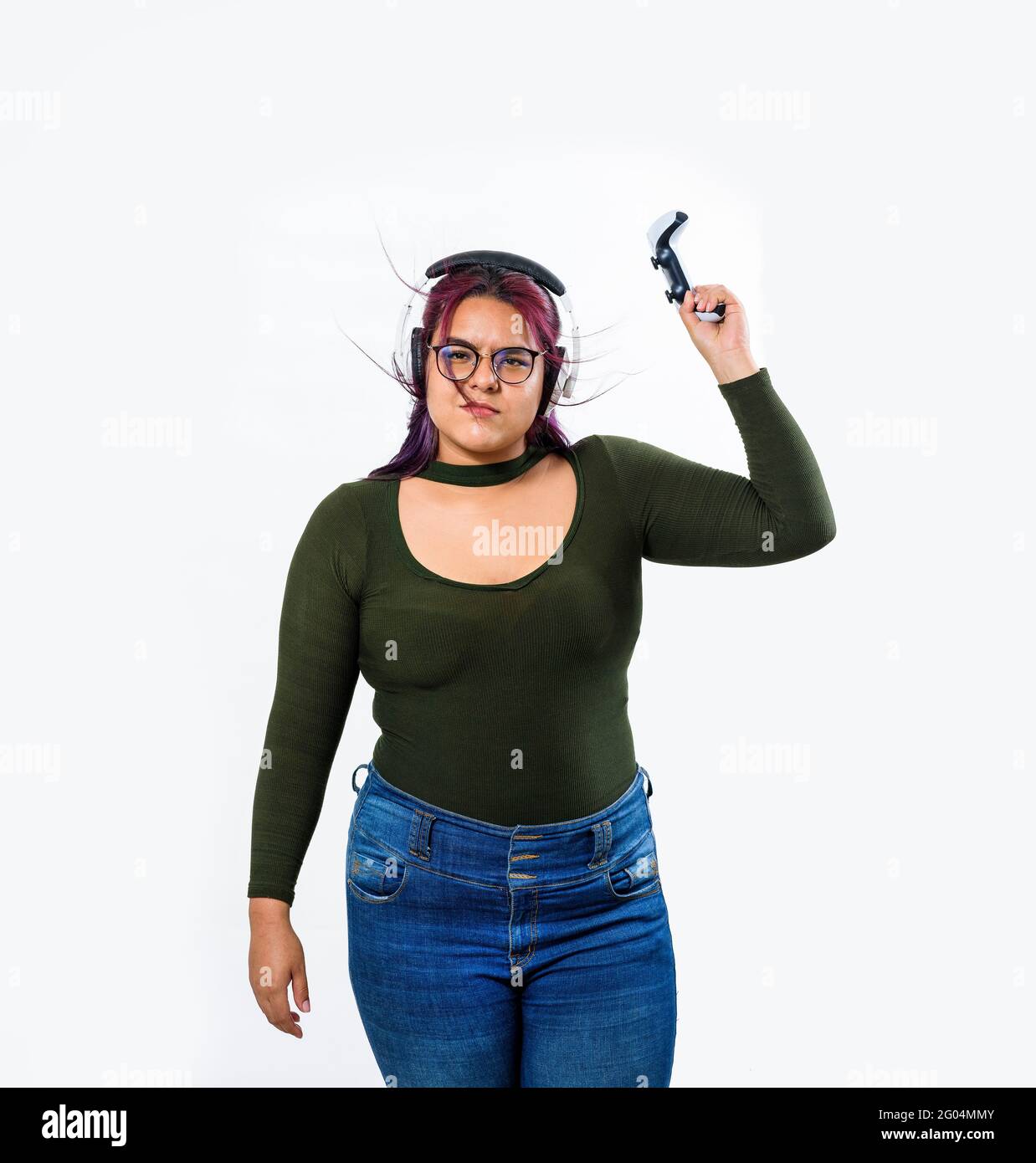 Latin woman with video game control - Text space Stock Photo - Alamy