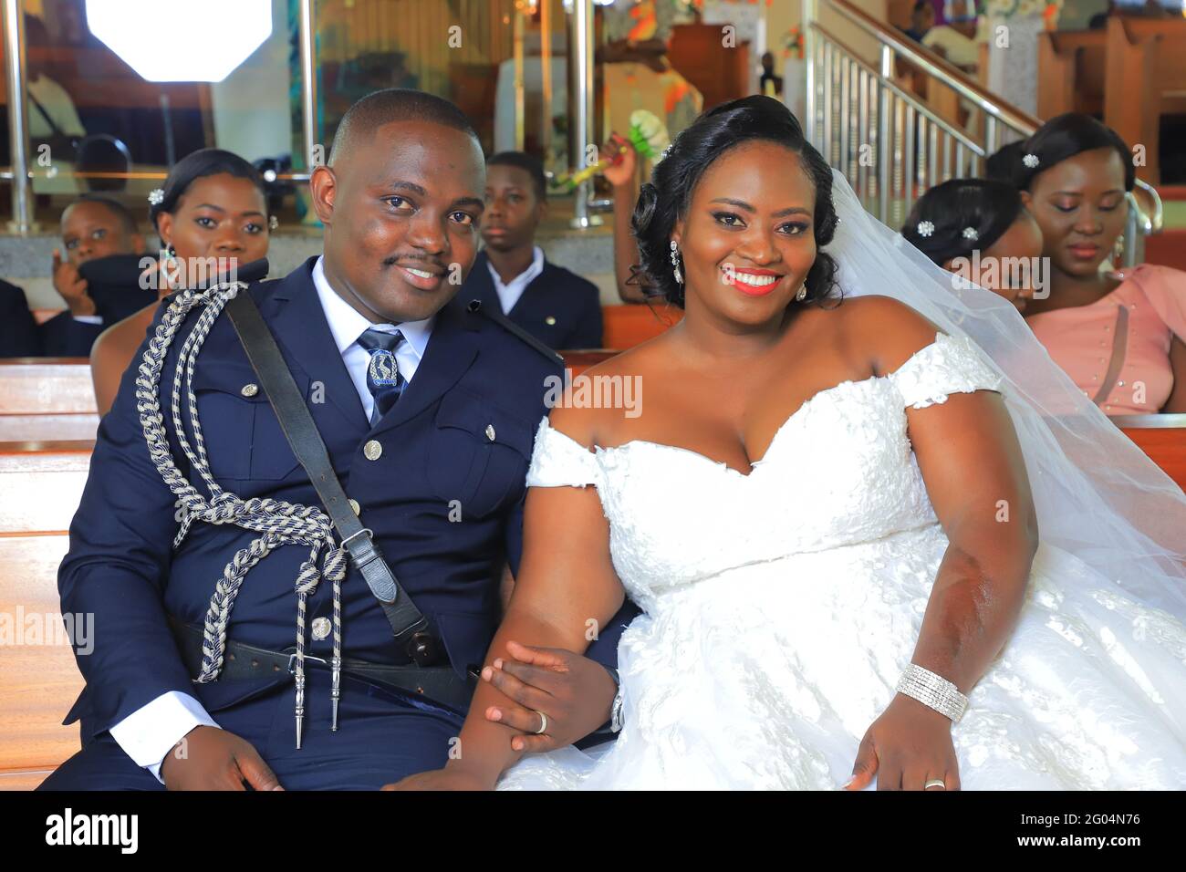 KA, UGANDA - May 31, 2021: The bride and the groom on their wedding day ...