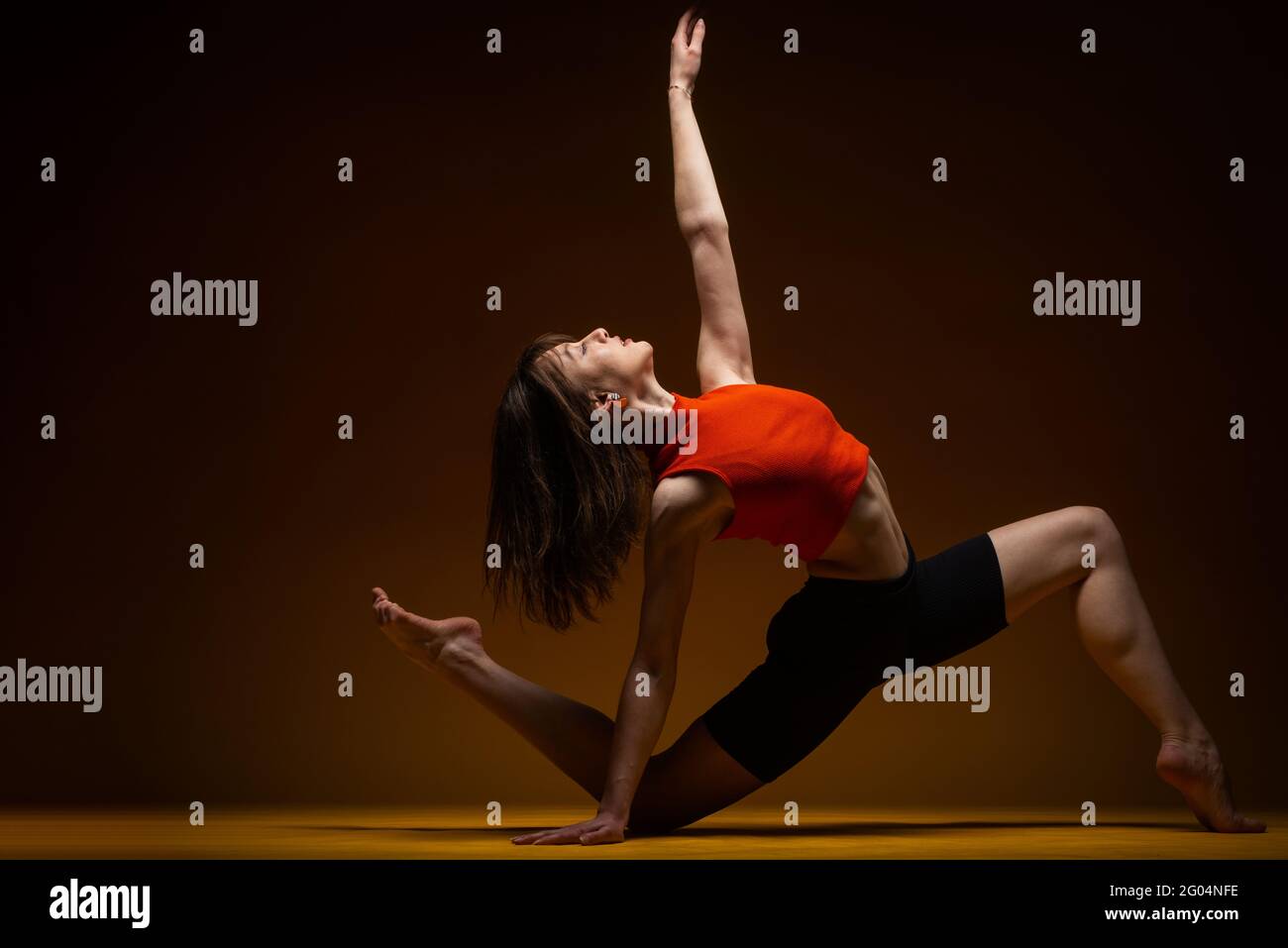 Ballerina is having a perfect posture while doing a perfect ballet pose ...