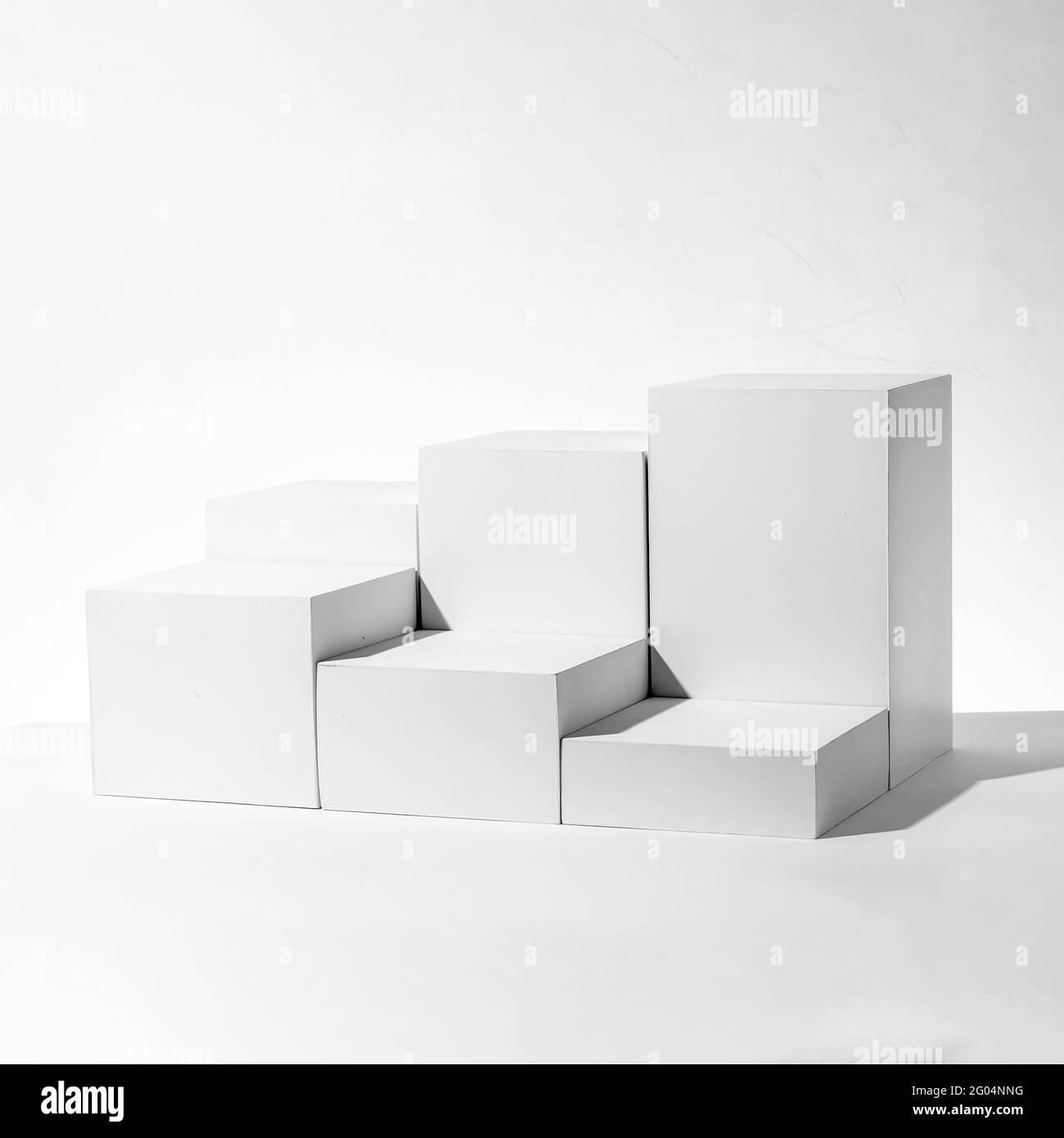 3D rendering of square blocks arranged like a staircase in a bright ...