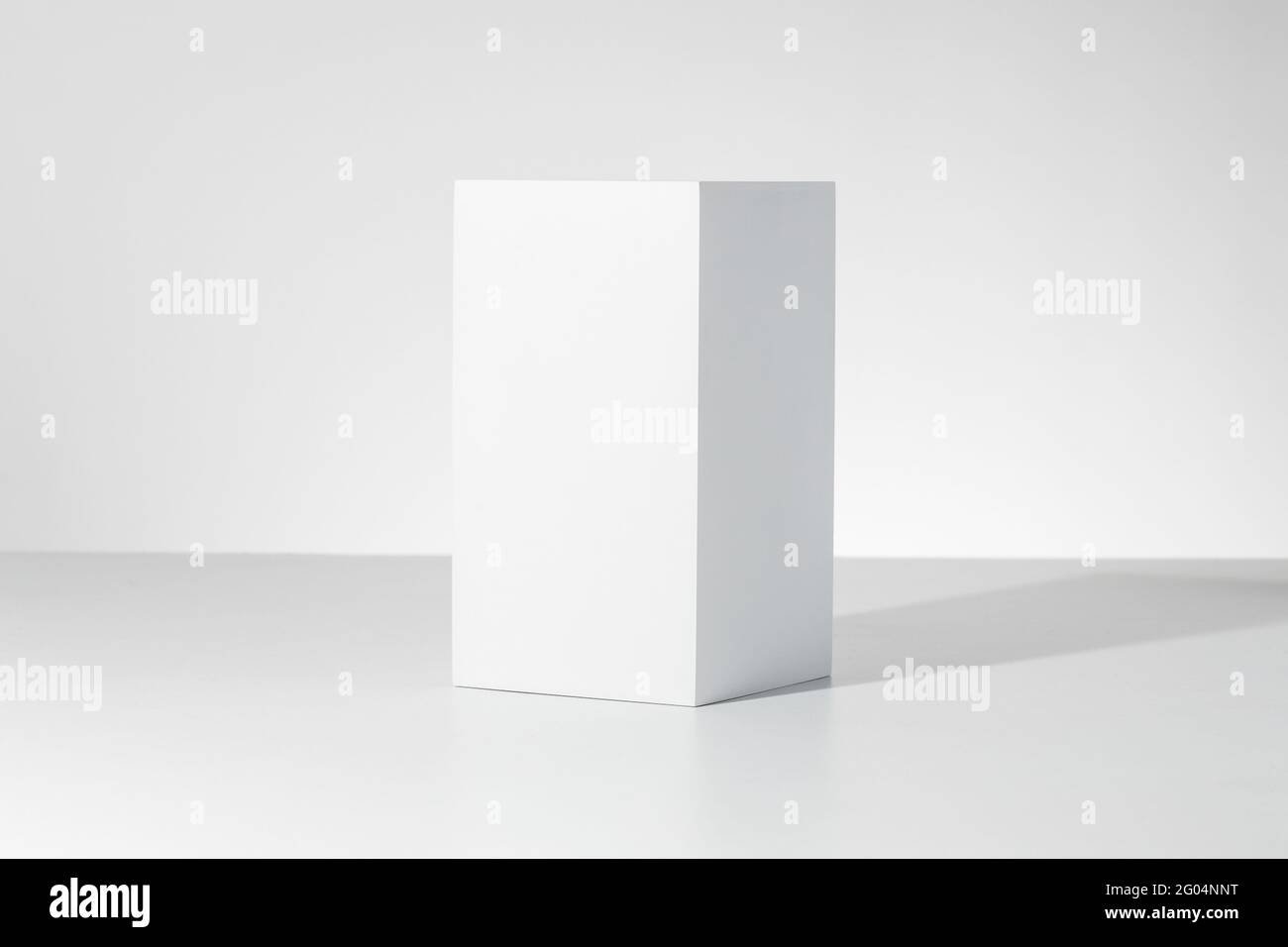 3D render of a simple white rectangle block casting a long shadow in an ...