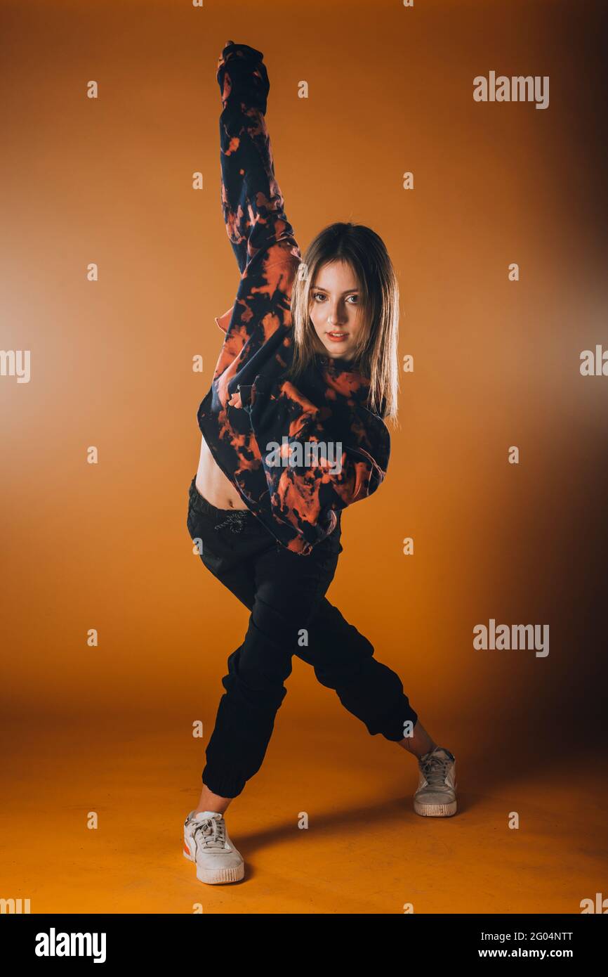 Athletic dancer performing an element of dance gymnastics Stock Photo ...