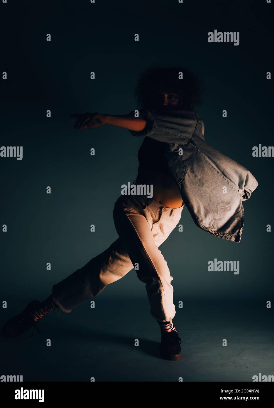 Athletic dancer performing an element of dance gymnastics Stock Photo ...