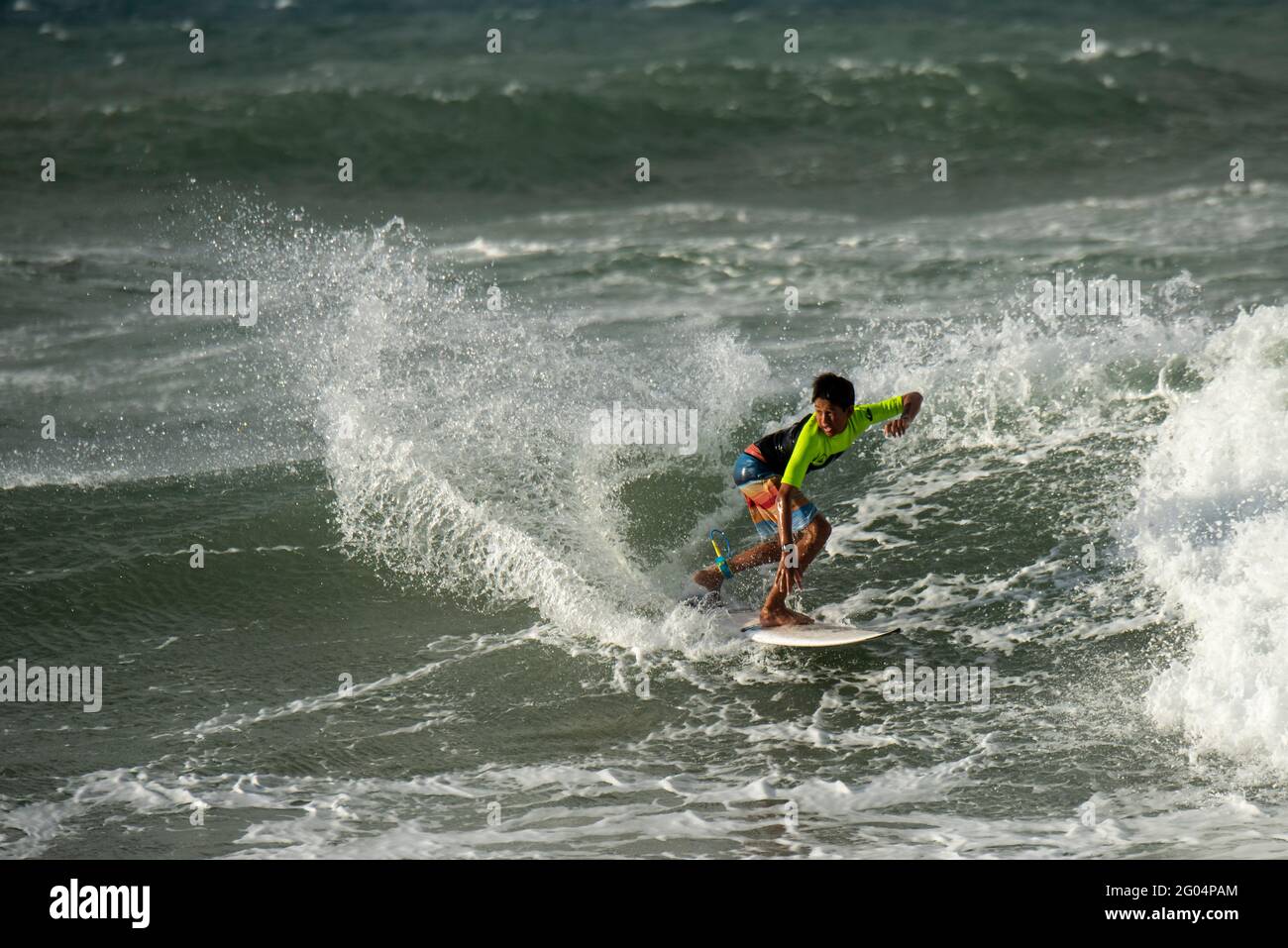 Maui, Hawaii. Surfer riding the waves in the pacific ocean Stock Photo ...