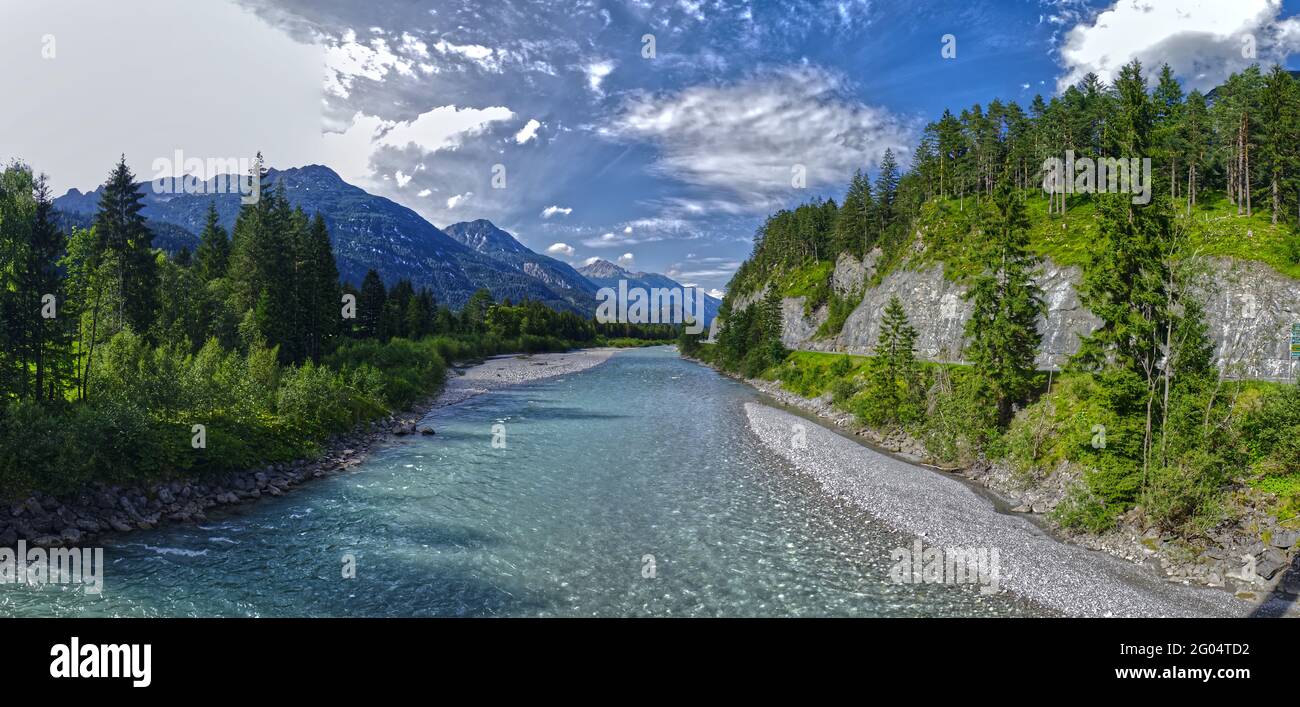 Beautiful shot of Lech river surrounded by scenic landscape field and ...
