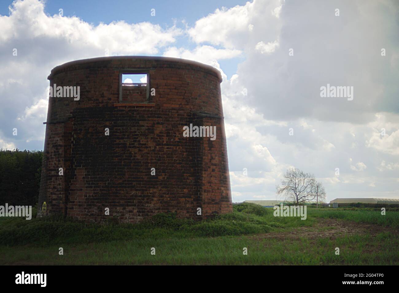 Historic red brick Windmill Stock Photo - Alamy