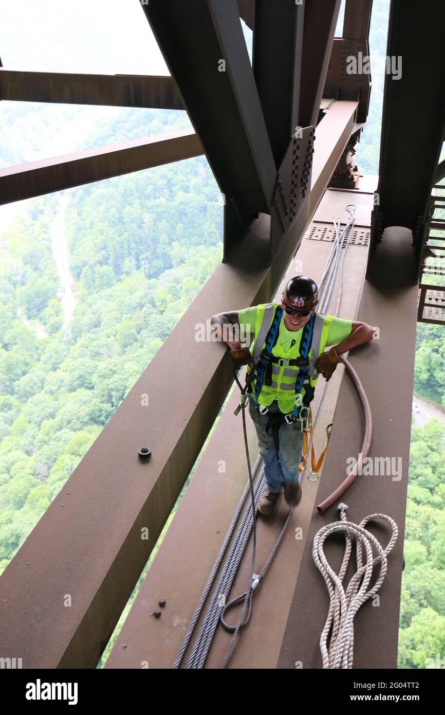 Construction and bridge workers on the New River Gorge Bridge, West ...