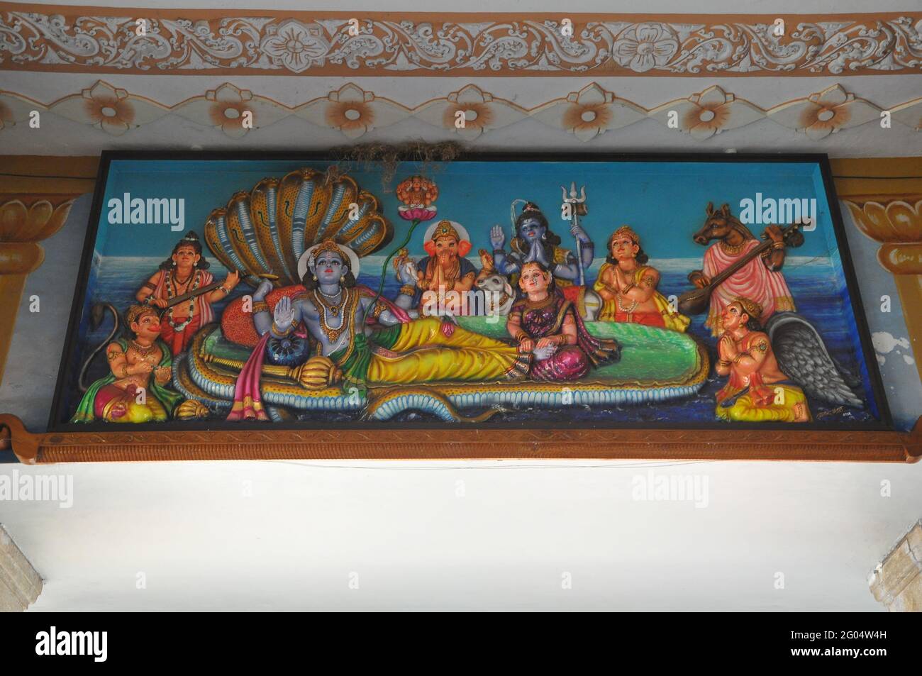 Colorful Hindu religious art on the wall Stock Photo - Alamy