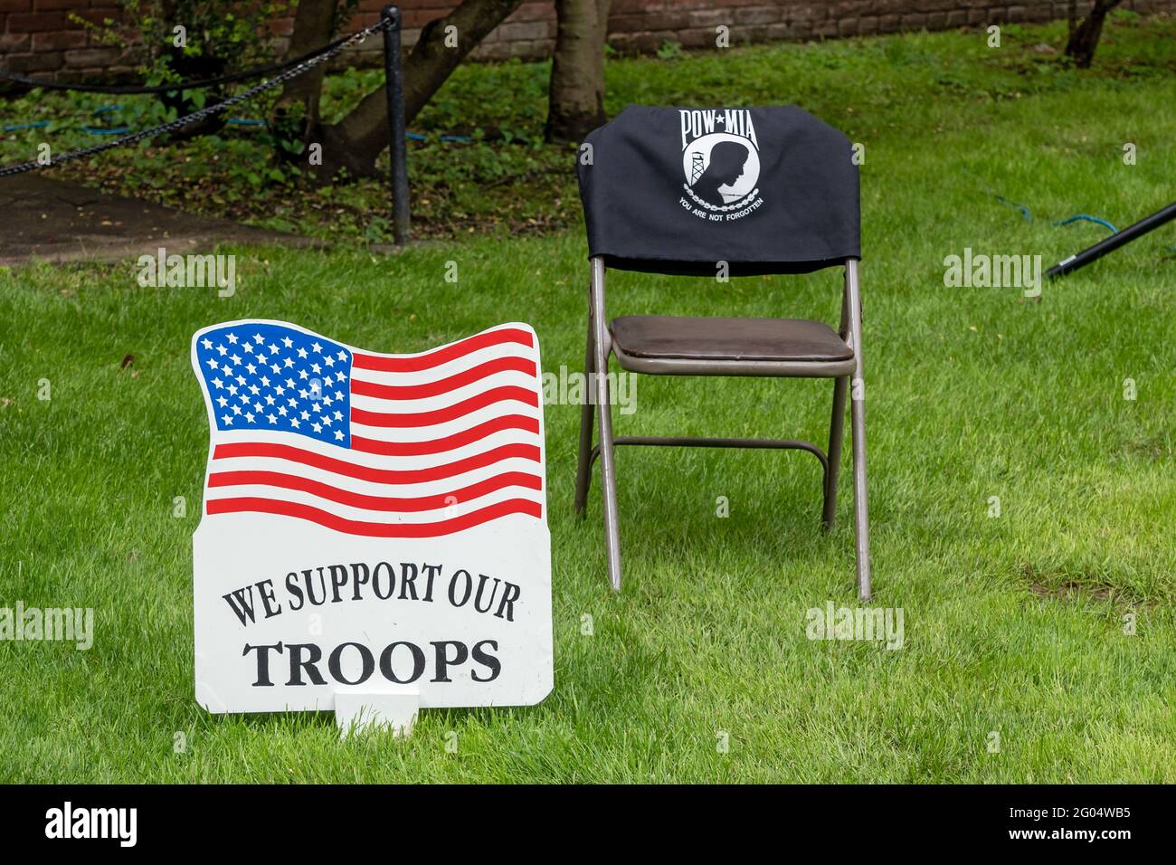 NEW YORK, NY – MAY 31: A sign that reads "we support our troops" and ...