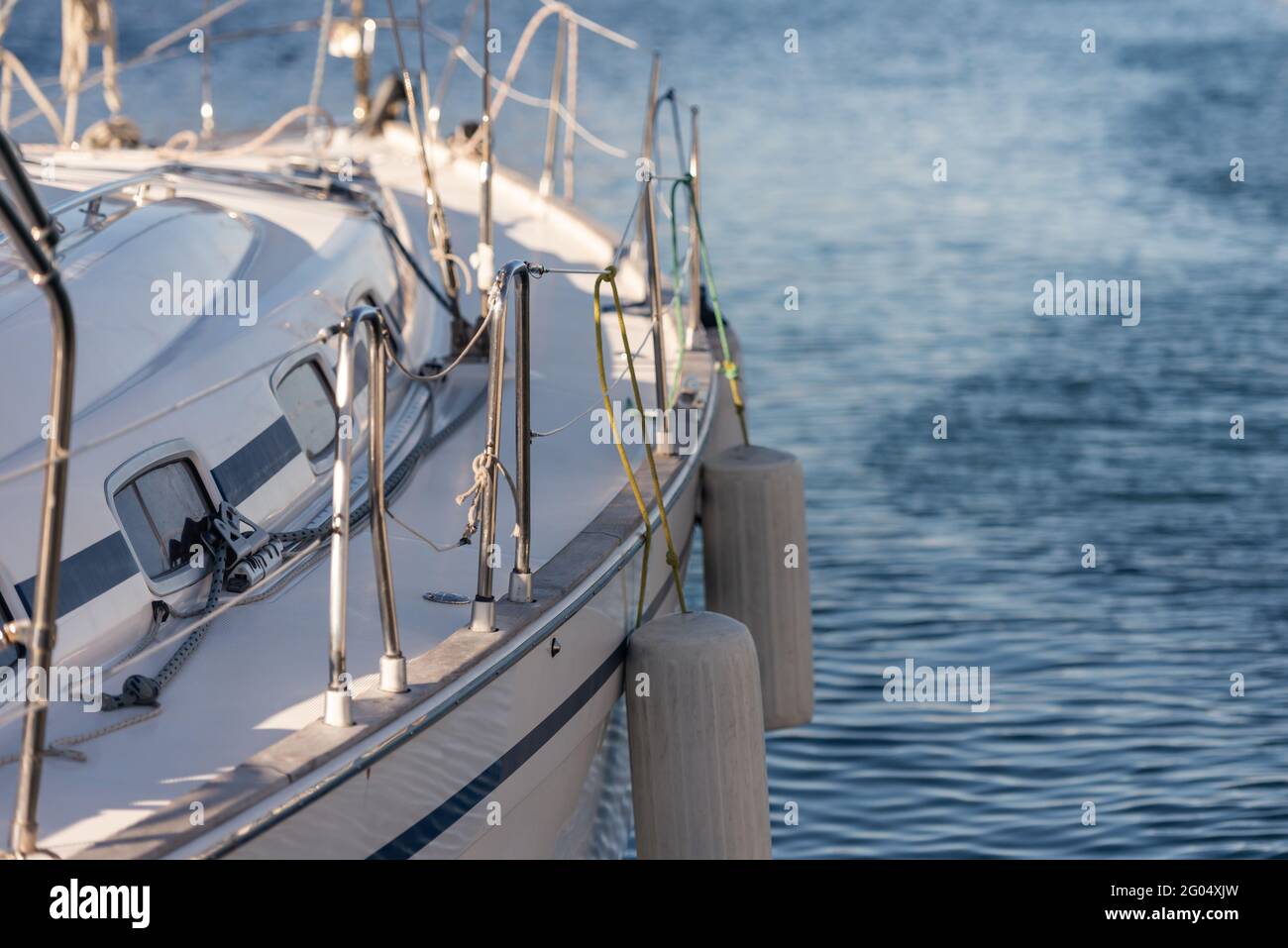 Yacht side with mooring fenders. The side of the yacht in the parking ...