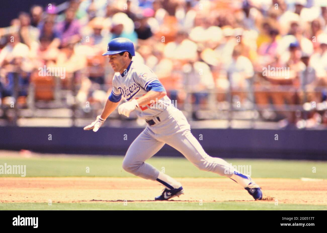 Los Angeles baseball player Brett Butler, running toward second base ...