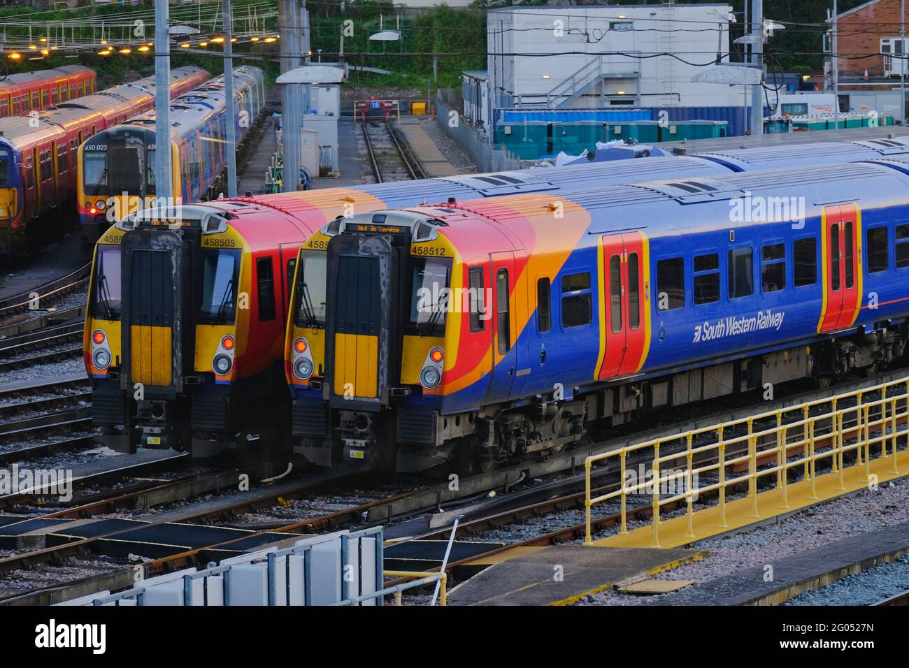 South Western trains in position on railway sidings outside a London ...