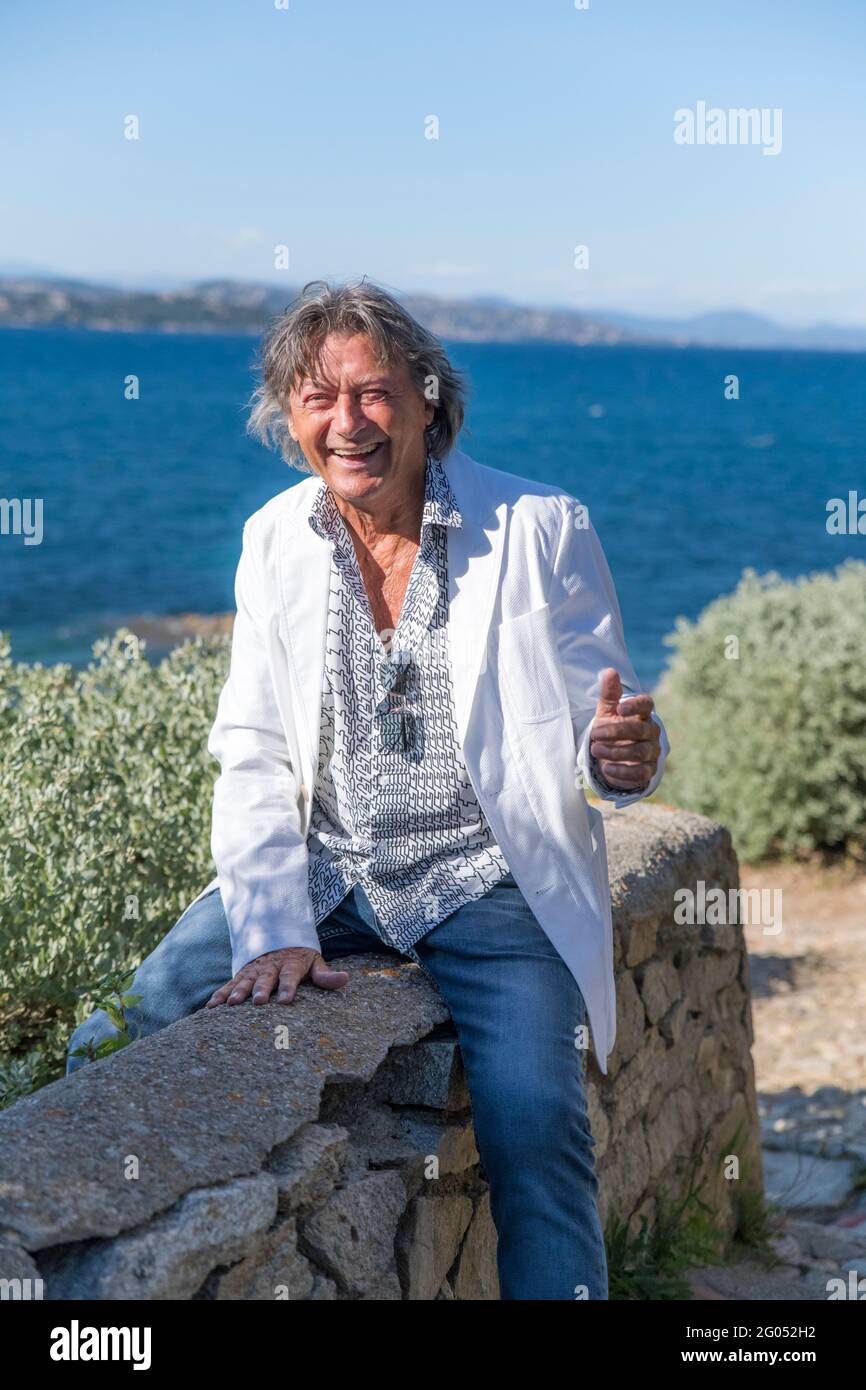 Saint Tropez, France. 25th May, 2021. Actor Herbert Herrmann sits on a ...