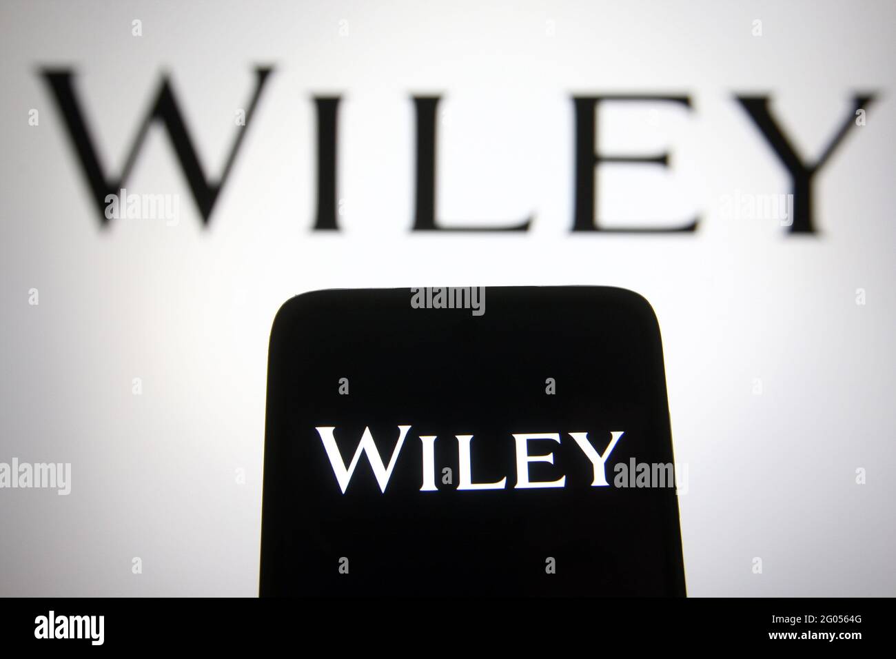 In this photo illustration the Wiley (John Wiley & Sons) logo is seen ...