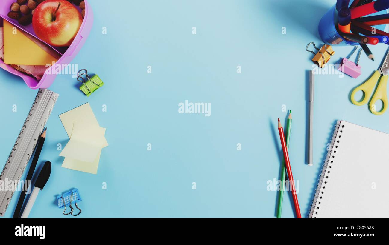 Primary school flat lay concept with assorted school supplies, notepad ...