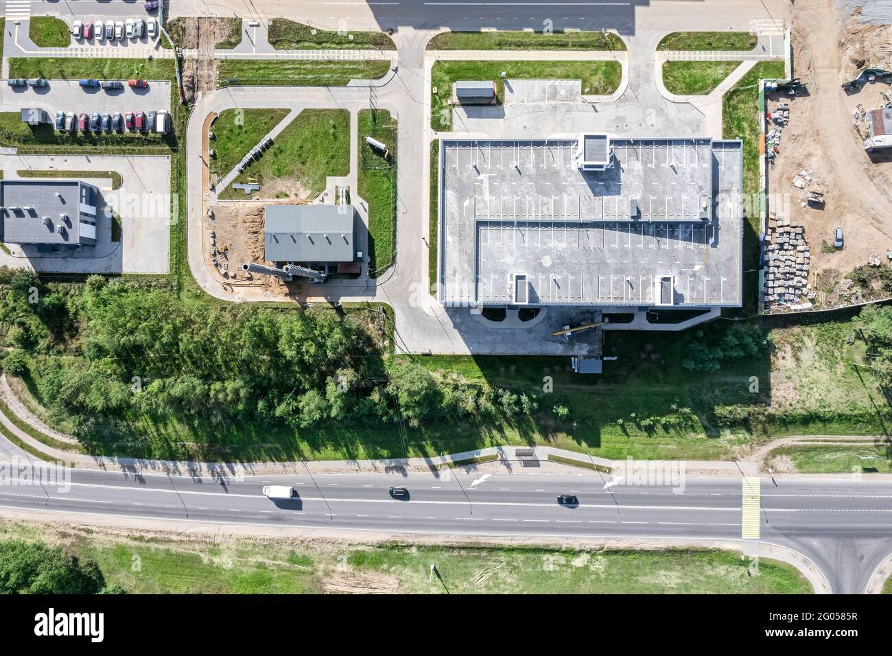 multilevel parking garage under construction in new residential area ...