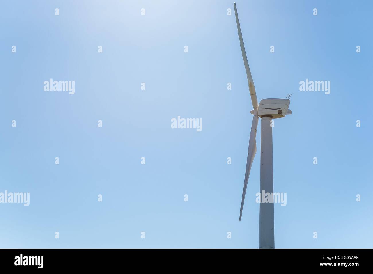 Wind power,one wind turbine and blue sky.wind power concept with copy ...