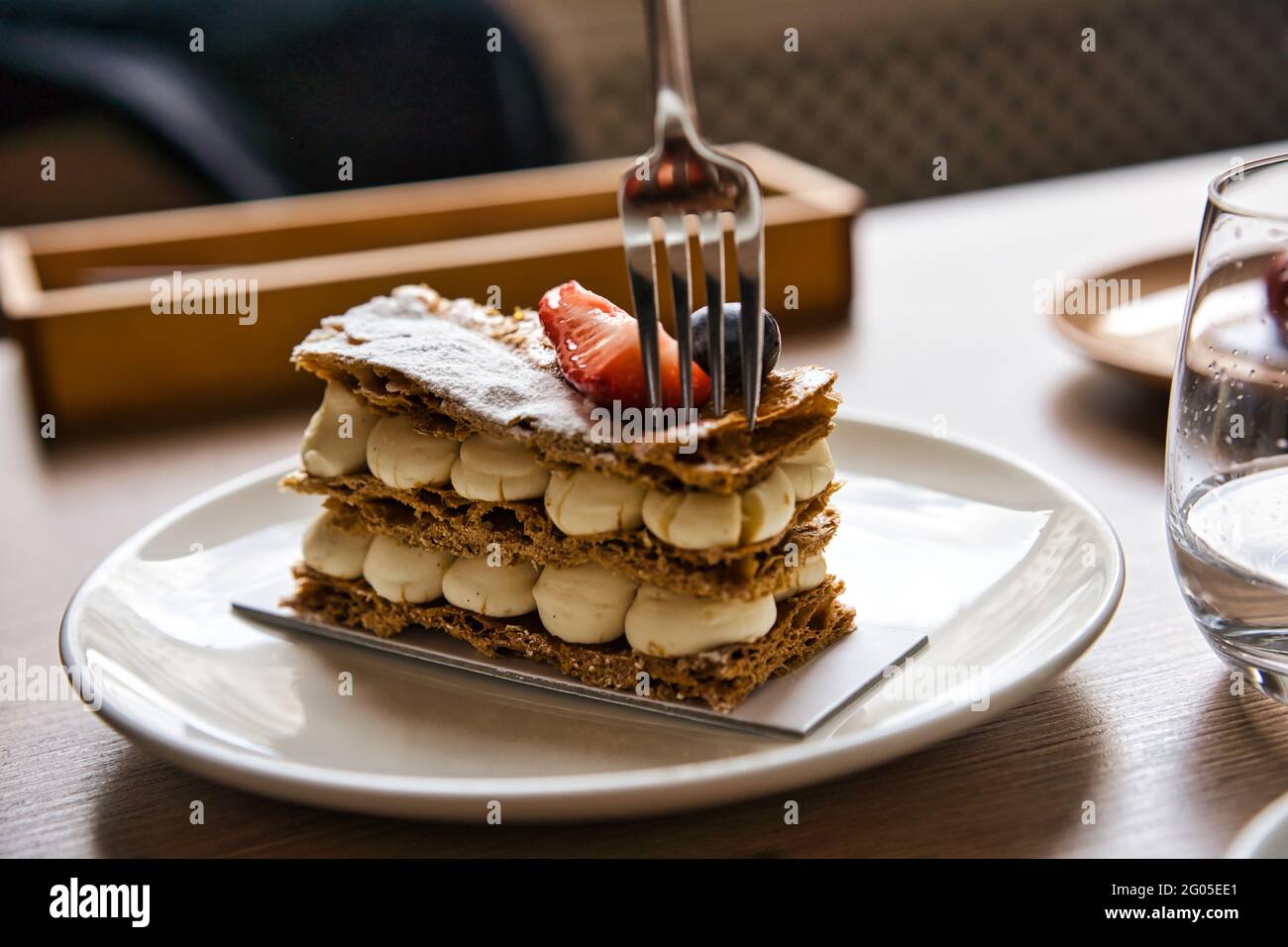 Classic milfey cake with cream in the bowl Stock Photo - Alamy