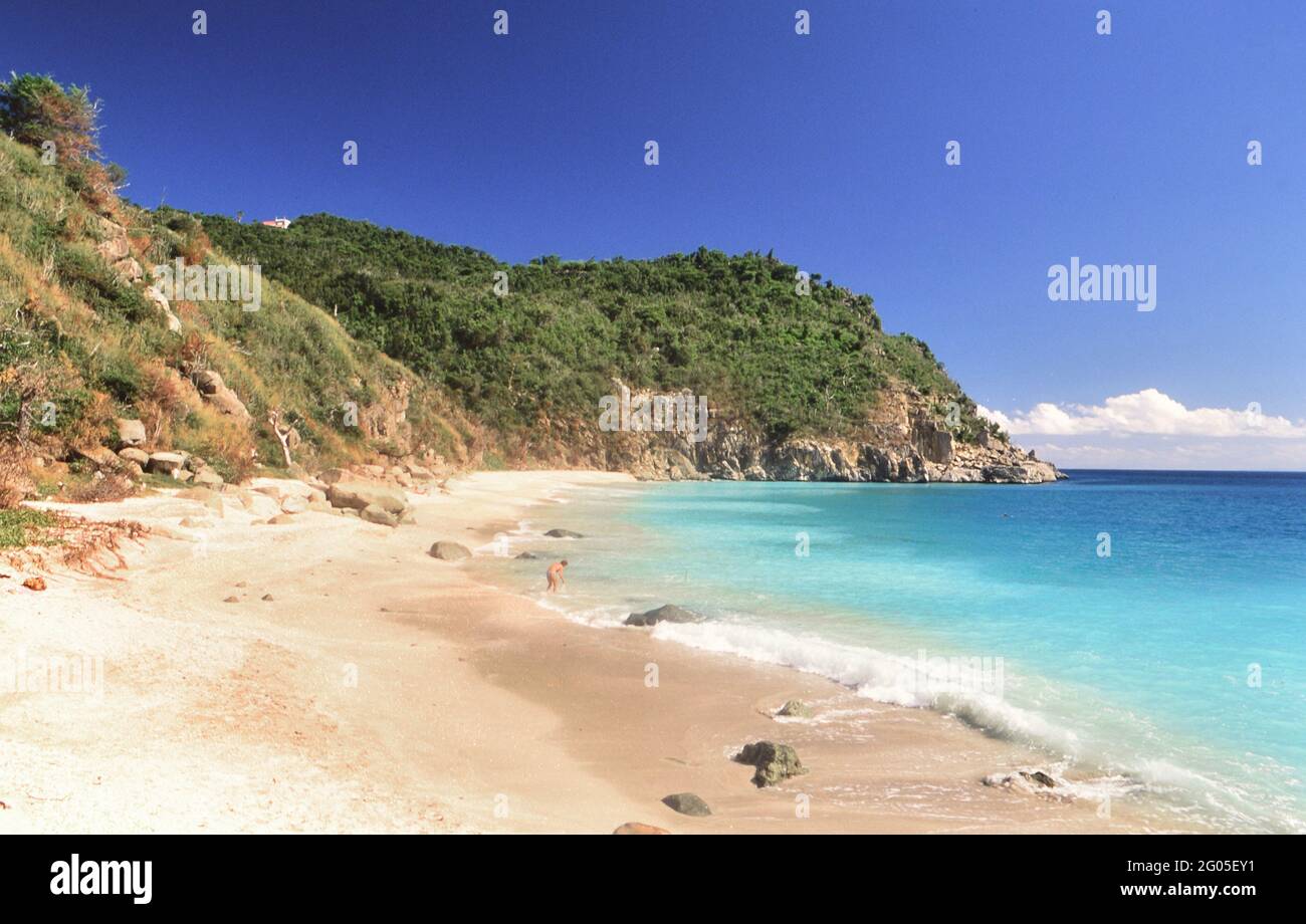 Visitors relax and play on the Anse des Grands Galets (Big Shell Beach ...
