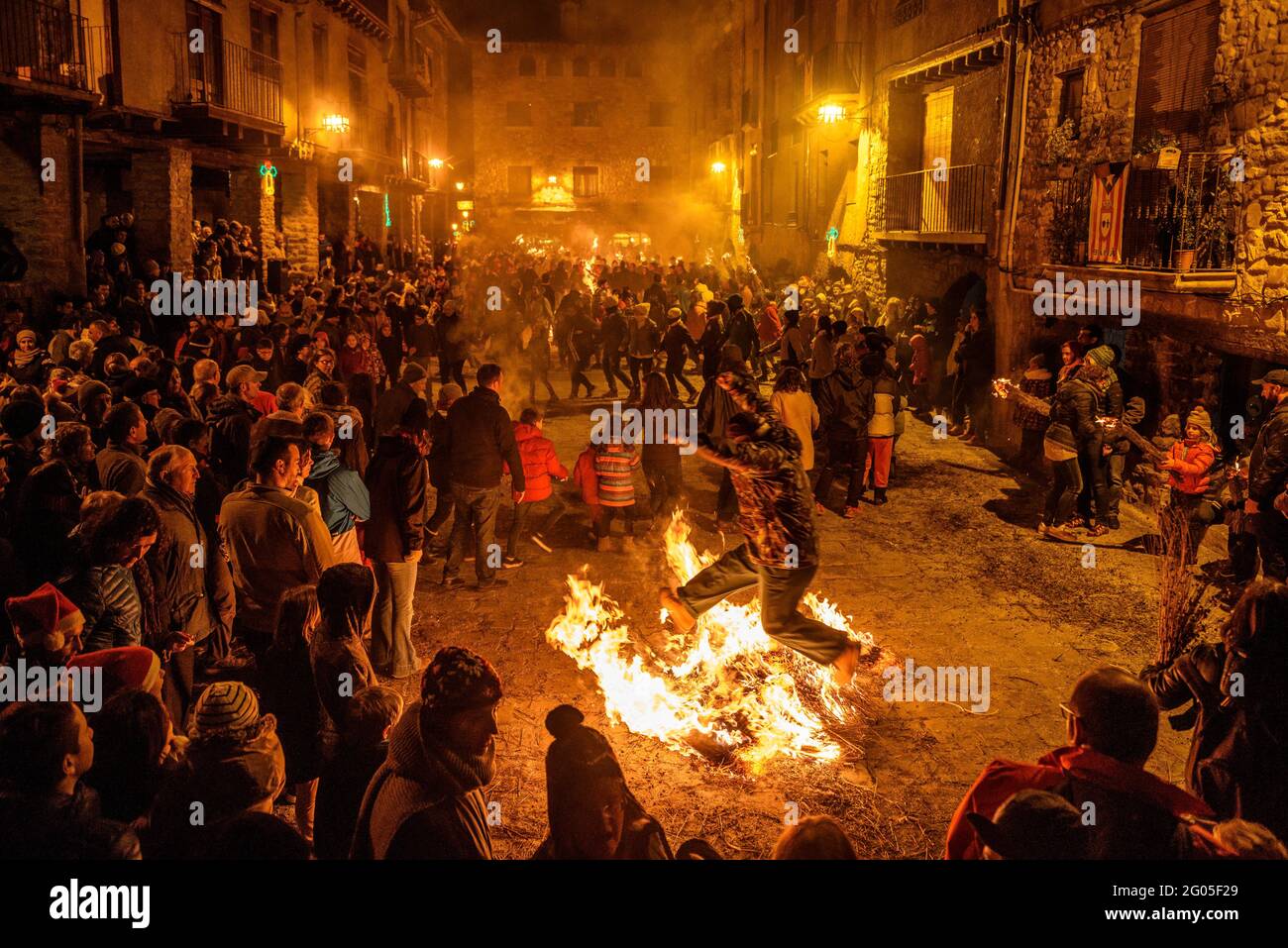 Dances around the fire in the Galceran de Pinós square, in Bagà during ...