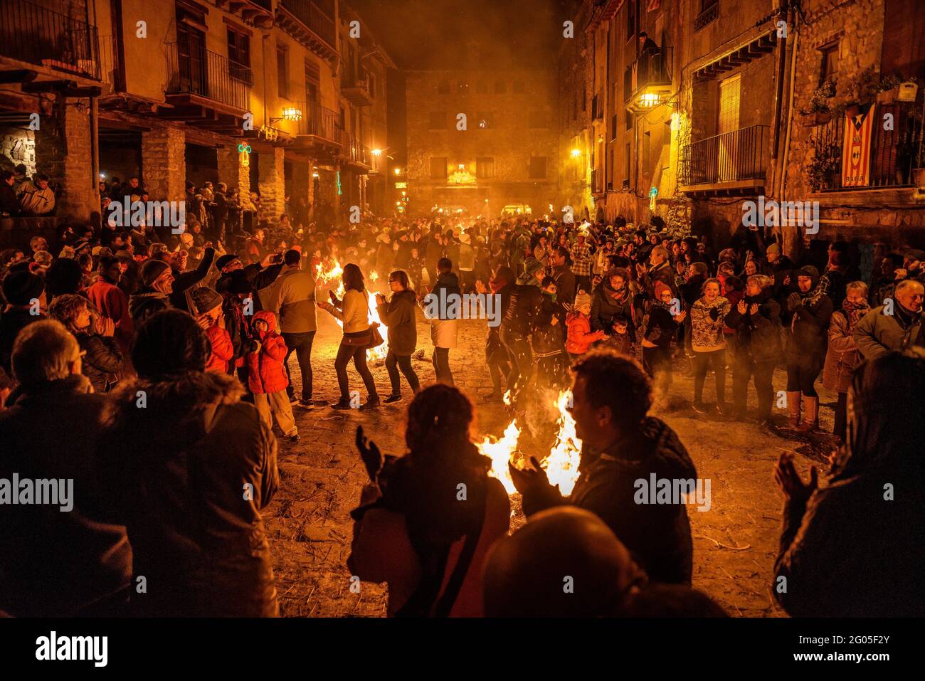 Dances around the fire in the Galceran de Pinós square, in Bagà during ...