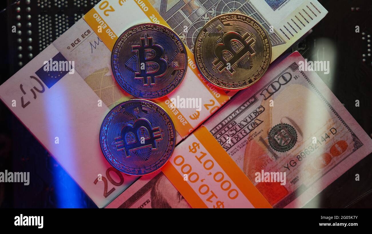 Bitcoin (BTC) on 200 euro and 100 dollar bills in police siren lights ...