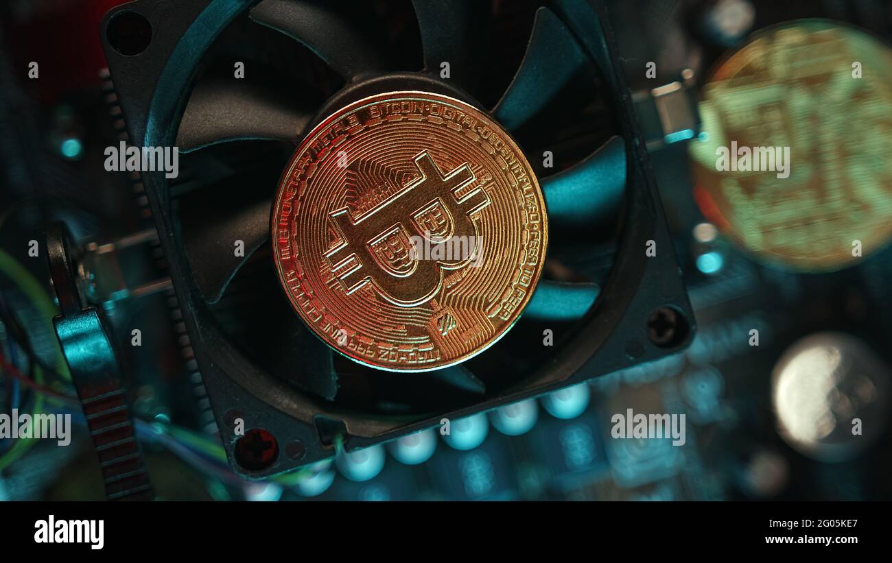 Physical Bitcoin (BTC) on the motherboard and processor (CPU) finance ...