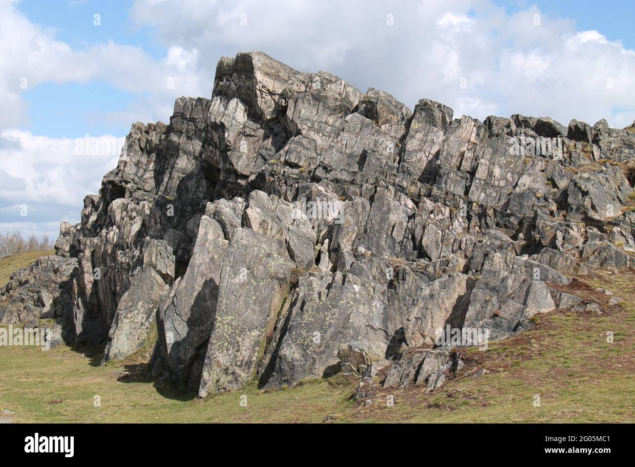 A Natural Large Rock Outcrop on a Countryside Hillside Stock Photo - Alamy