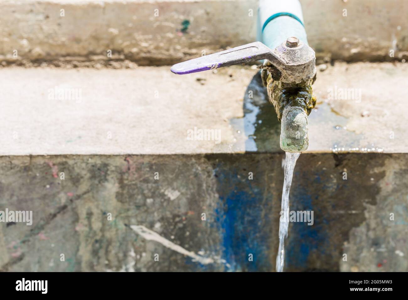 water source rusty valve, pipe, tap with moss on it Stock Photo - Alamy