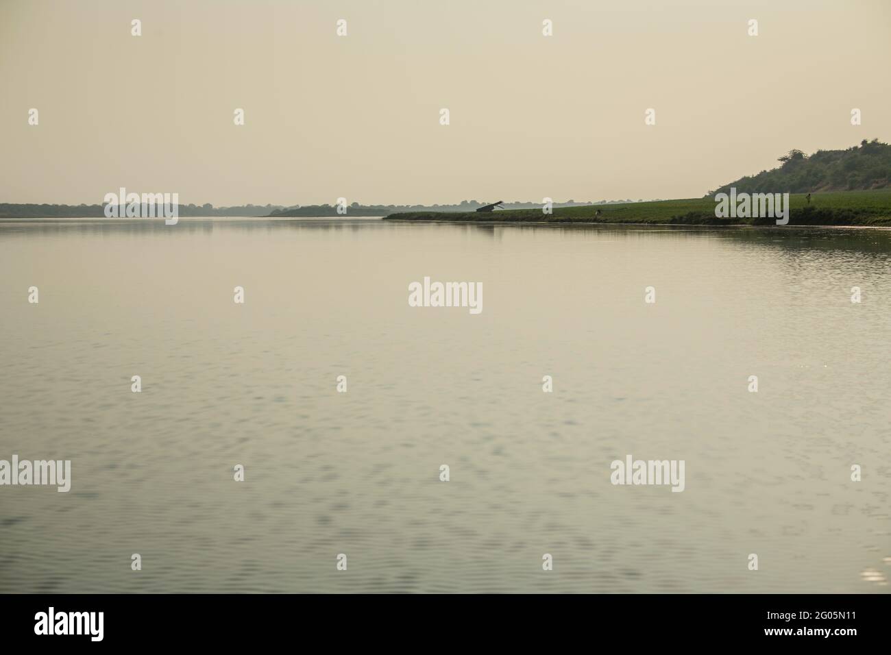The beautiful and calm river Chambal as it flows separating Rajasthan ...