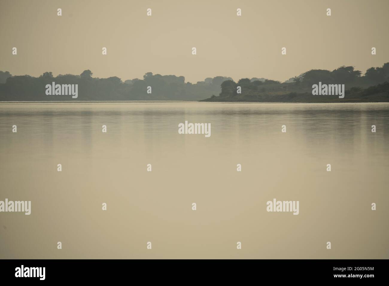 The beautiful and calm river Chambal as it flows separating Rajasthan ...