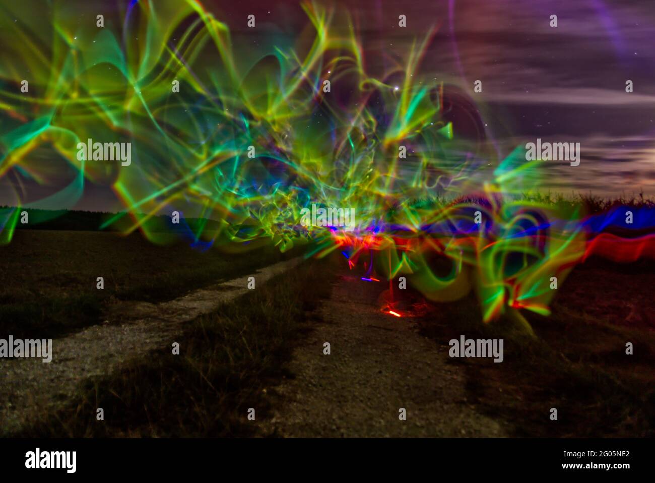 Neon light drawing for wallpaper and background Stock Photo - Alamy