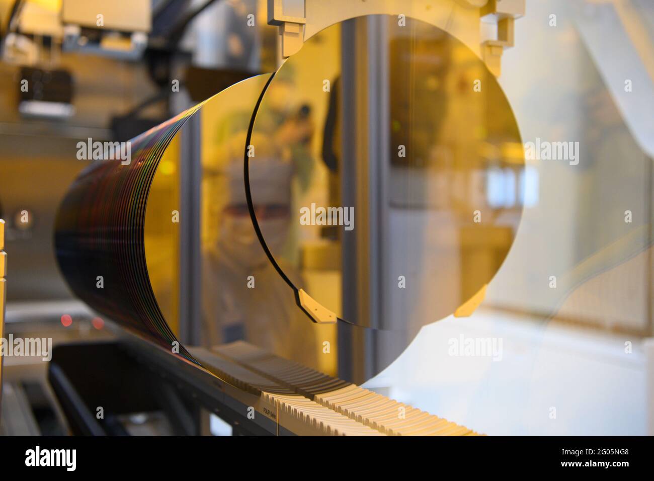 31 May 2021, Saxony, Dresden: An associate is reflected in a 300 ...