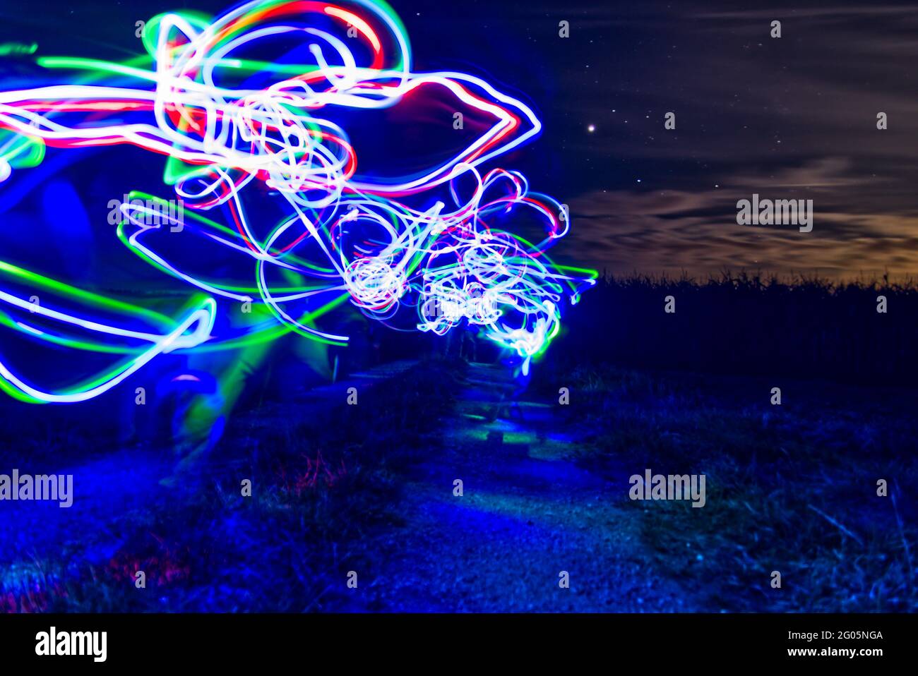 Neon light drawing for wallpaper and background Stock Photo - Alamy