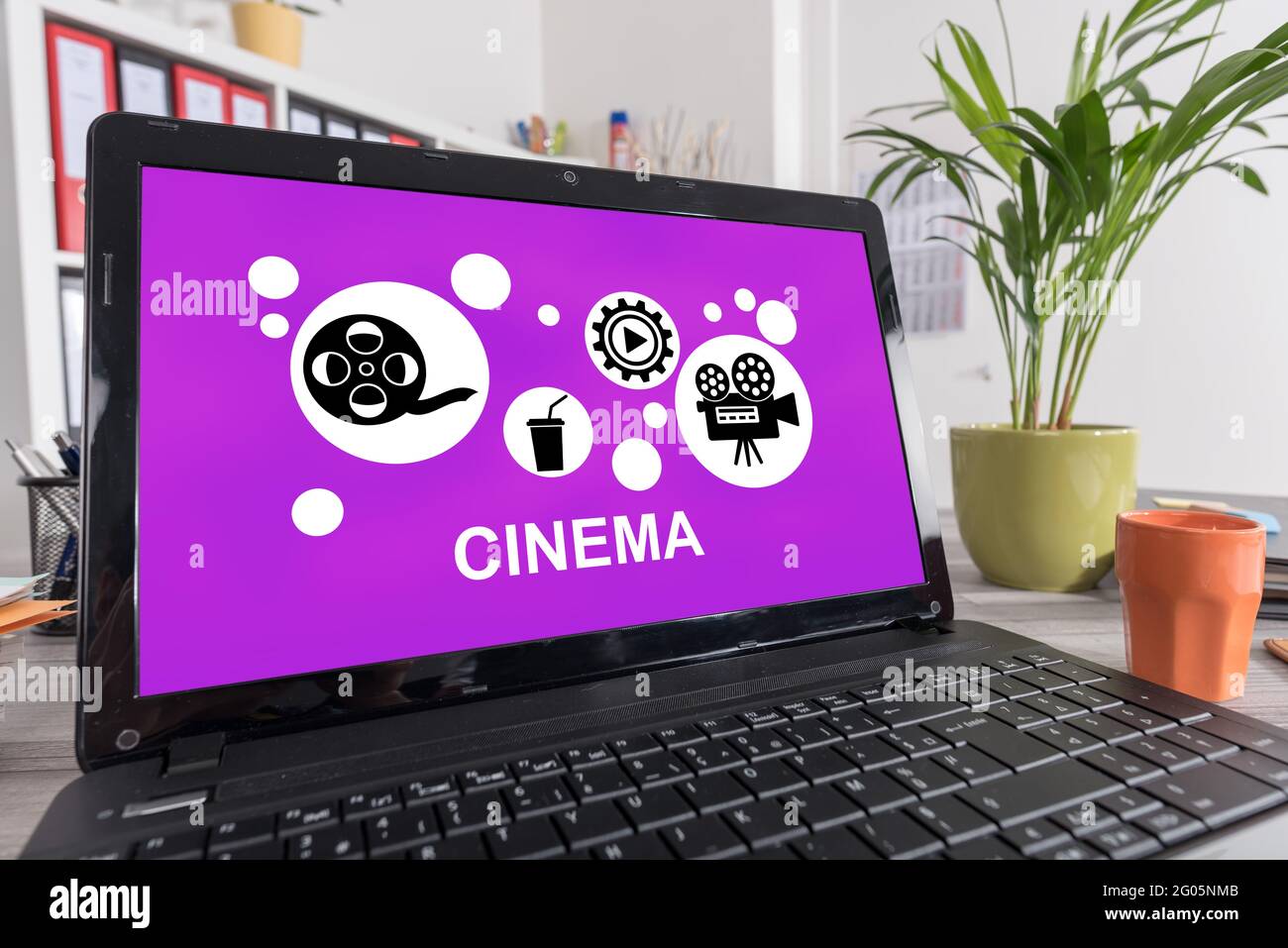 Laptop screen with cinema concept Stock Photo - Alamy