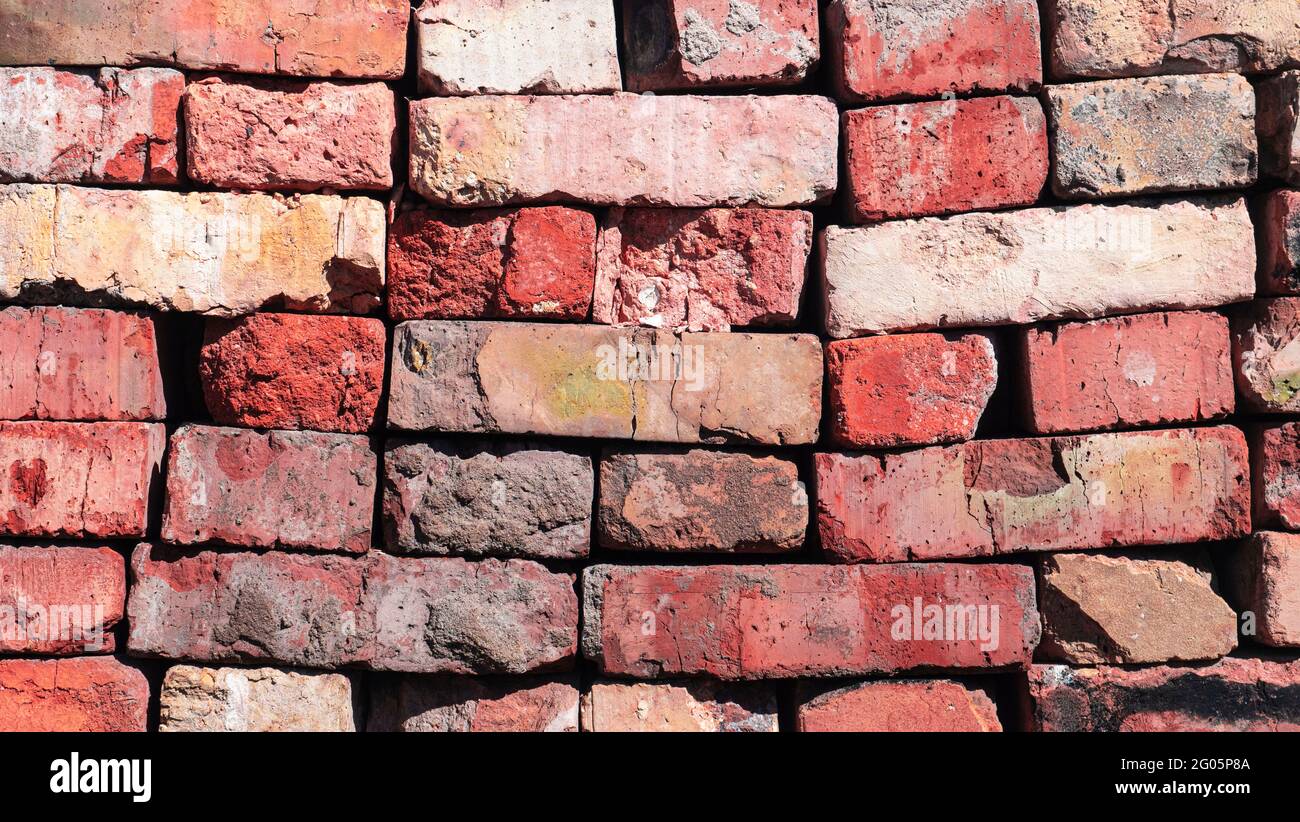 red bricks. a stack of bricks. red brick wall Stock Photo - Alamy