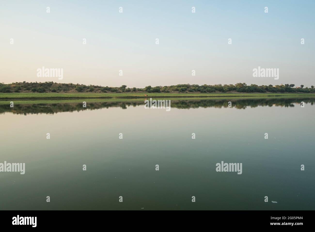The beautiful and calm river Chambal as it flows separating Rajasthan ...