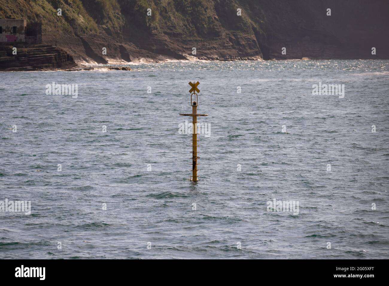Scenic view of yellow sea buoy floating in the sea Stock Photo - Alamy