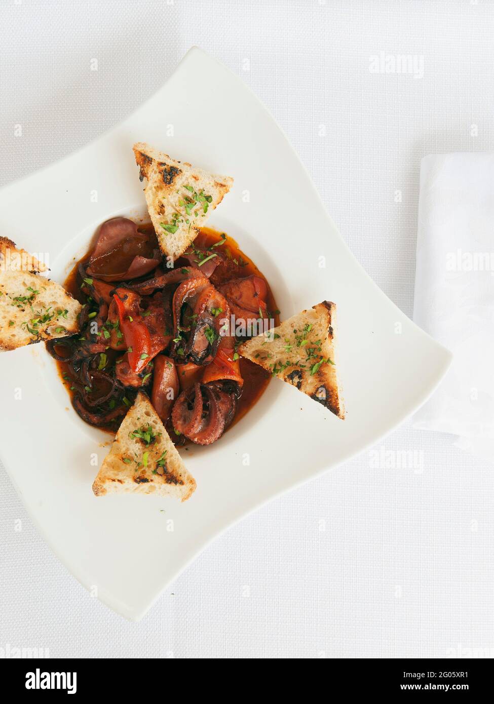 Octopus soup with squid and cuttlefish tufts and toasted bread, 1999 ...