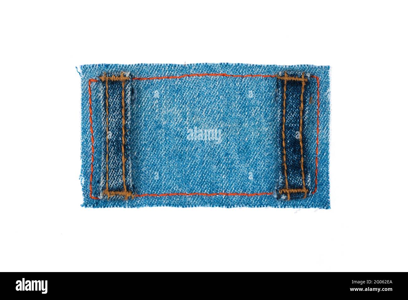 Denim tag with two jeans straps. Isolated white background Stock Photo ...