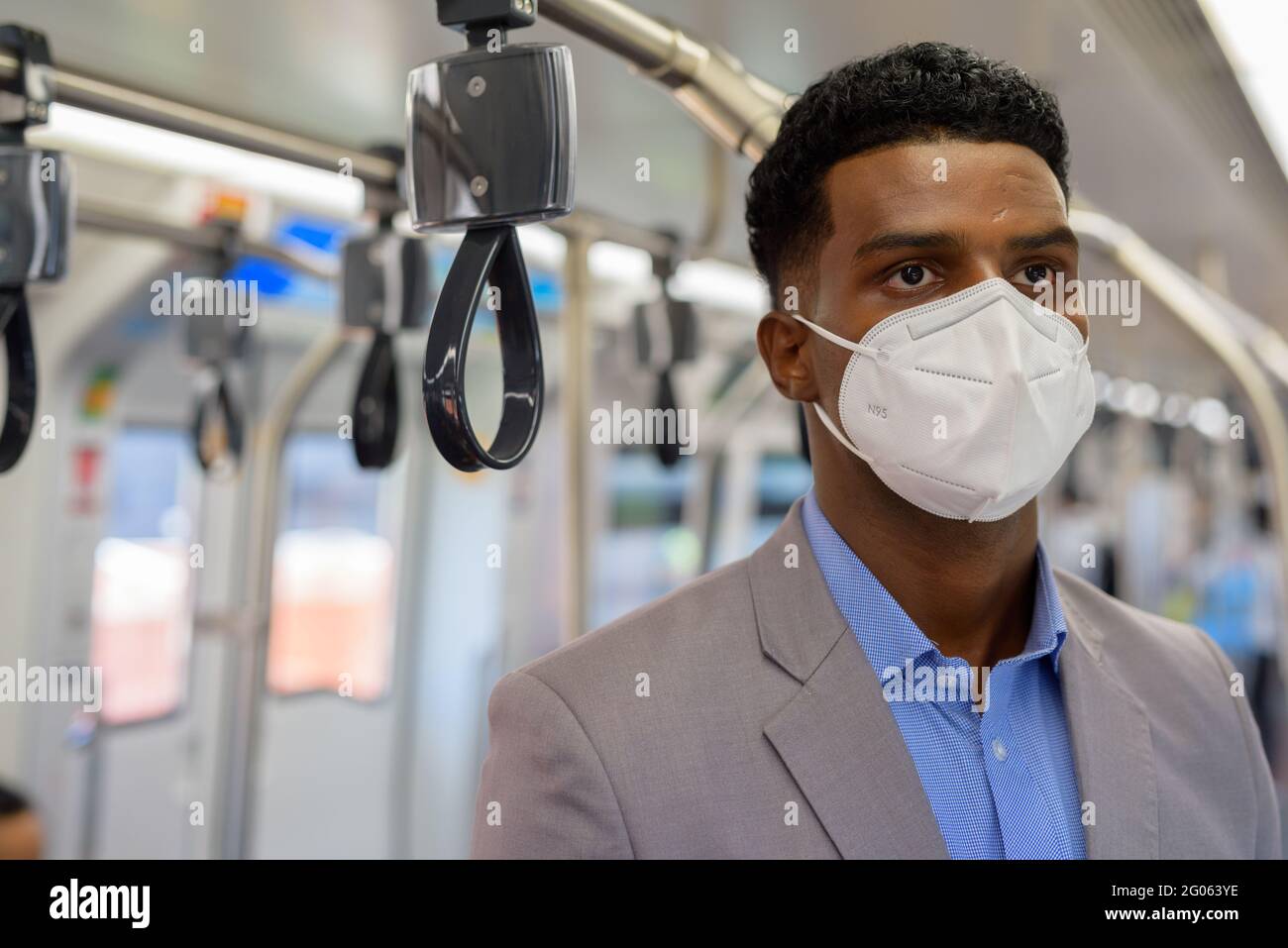 Man wearing face mask train travel hi-res stock photography and images ...