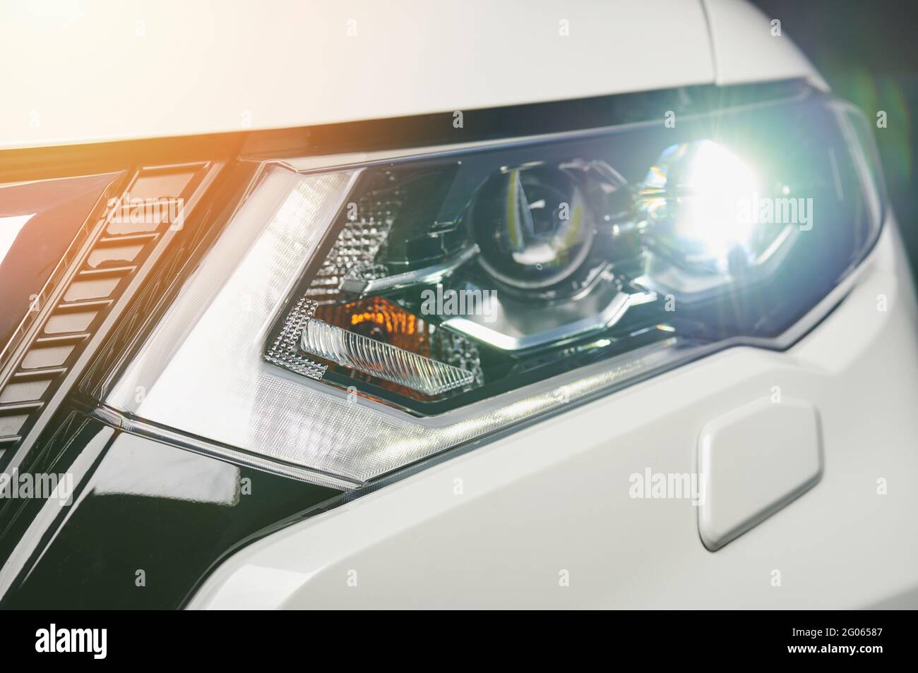 Car detailing theme. Close up of car headlight Stock Photo - Alamy