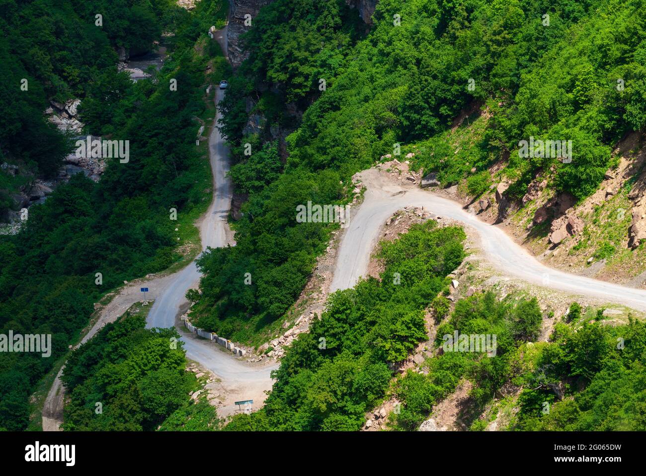 Winding road in the mountain Stock Photo - Alamy