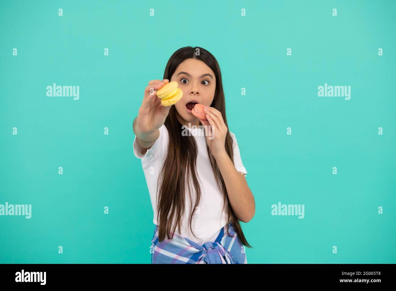 try it. macaroon cookie. confectionery. sweet french cakes. teen girl ...