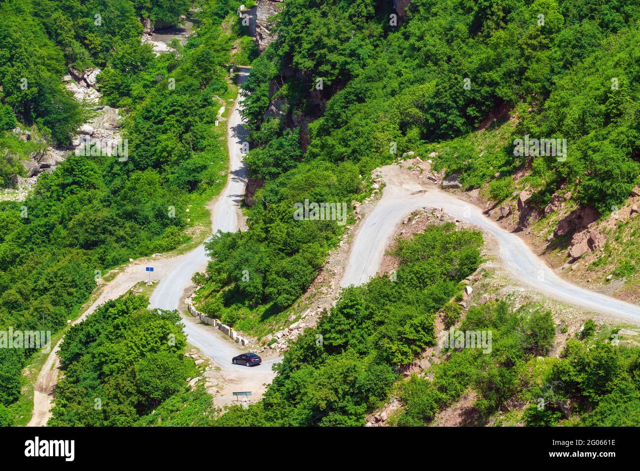 Winding road in the mountain Stock Photo - Alamy