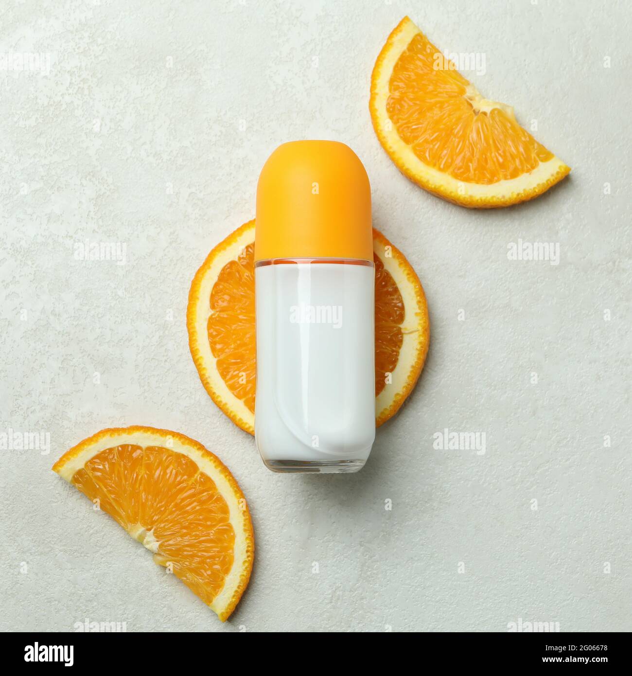 Blank orange deodorant on white textured background Stock Photo - Alamy