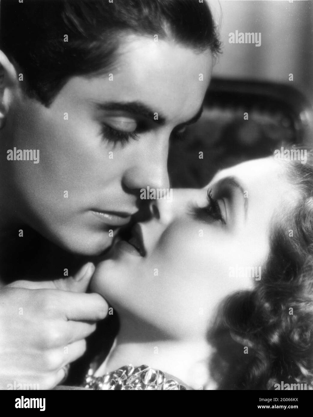 TYRONE POWER and LORETTA YOUNG kissing in CAFE METROPOLE 1937 director ...