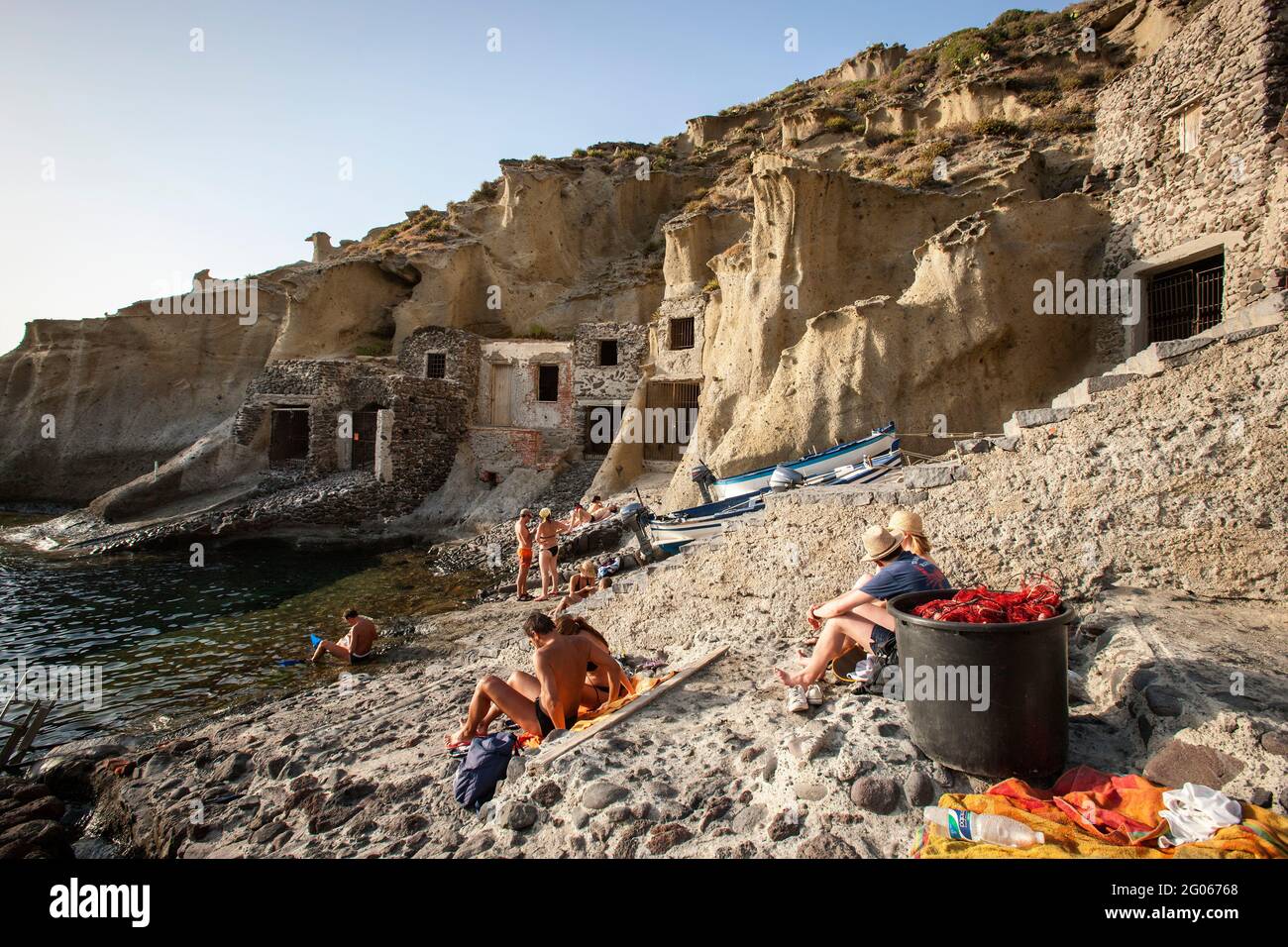Pollara beach, tuff cliff, garaging fishing boats, Salina island ...